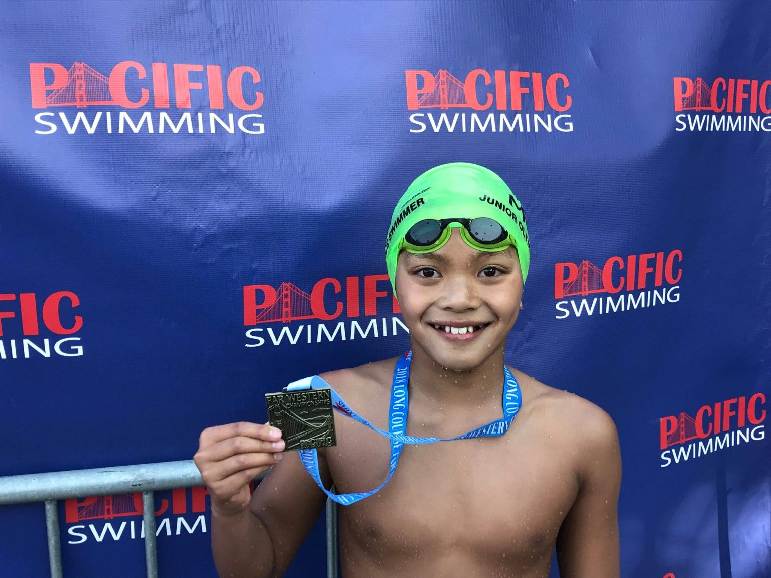 10-Year-Old Filipino-American Named Clark Kent Breaks Michael Phelps ...